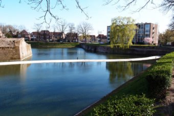 Floating Wooden Bridge Lets You Walk on Water to a Centenary Fortress ...