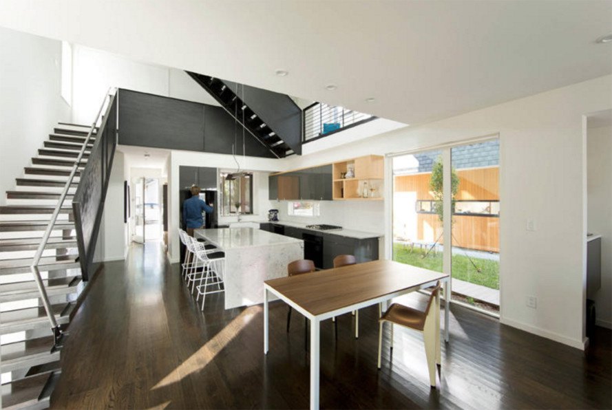 Two compact modern homes fill challenging empty lots in an old, urban ...