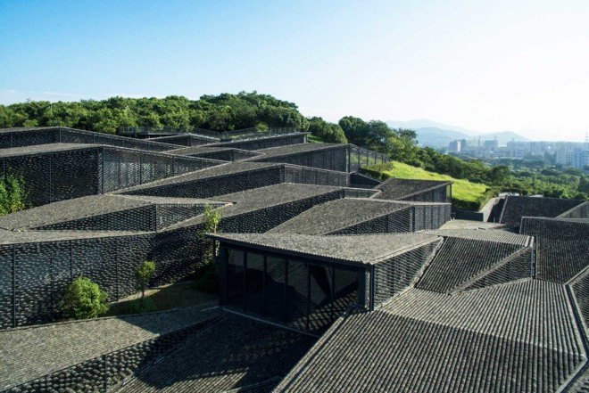China's new Folk Art Museum is topped with repurposed roof tiles that ...