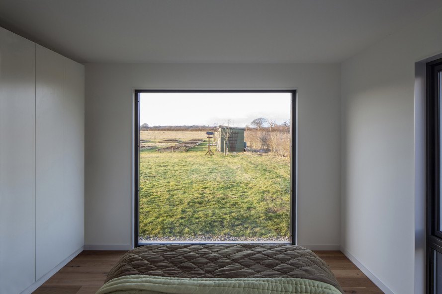 Howe Farm is an air-tight timber-clad farmhouse with a fresh new design