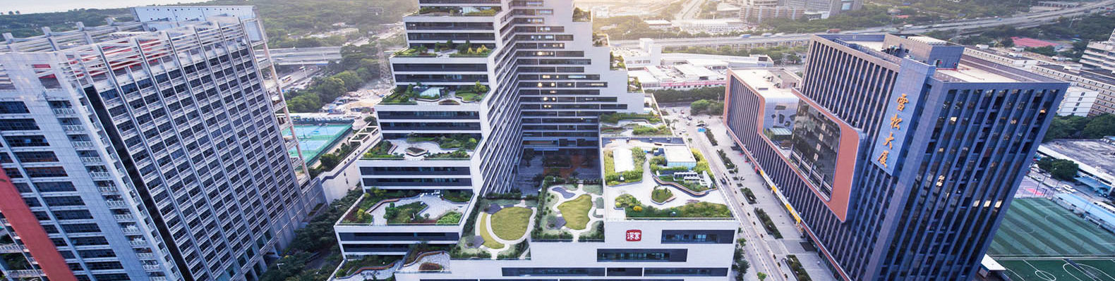 Cascading Shenzhen office building luxuriates under a stepped green roof