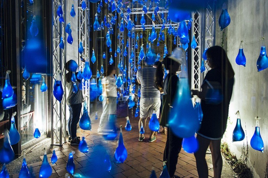 Thousands of water-filled condoms create an immersive “rainstorm” in Taiwan