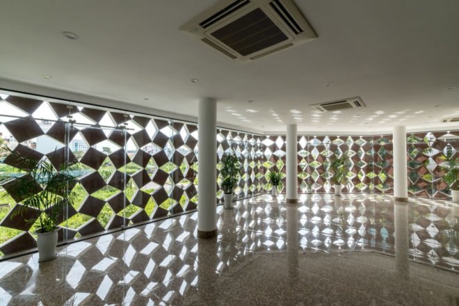 Properly Breathing House in Hanoi uses recycled ceramic bricks to keep ...