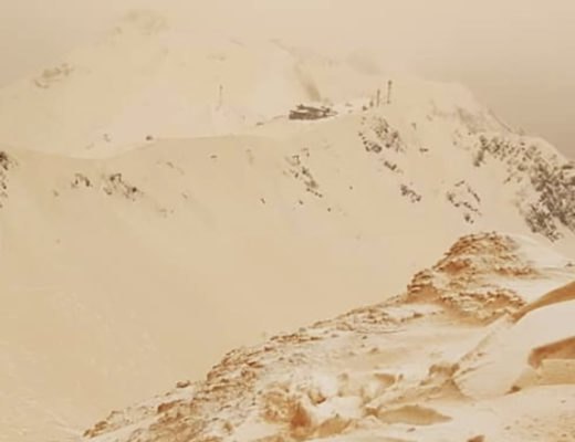 Orange snow covers the mountains across Eastern Europe
