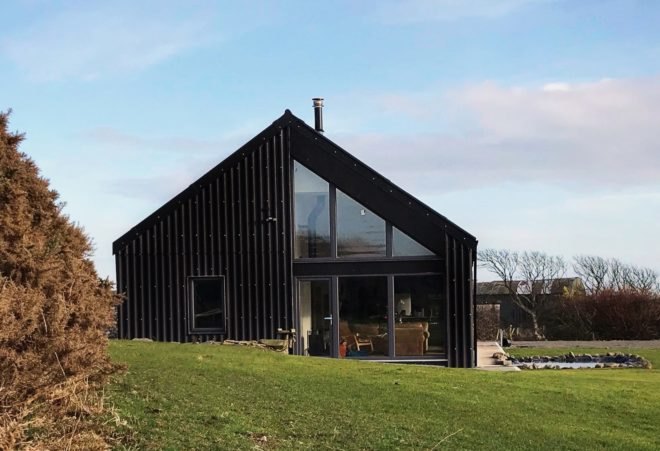 Metal-clad Eco Cottage puts a modern spin on Irish rural architecture