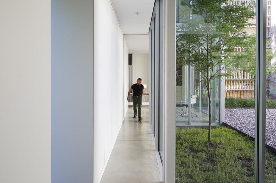 Twisting brick facade fronts an innovative courtyard house near Chicago