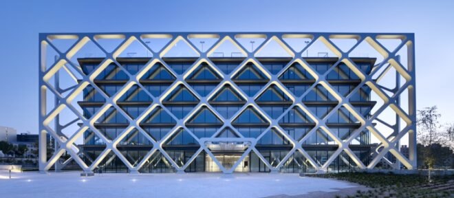 White, latticed exoskeleton wraps a LEED Platinum office in Madrid